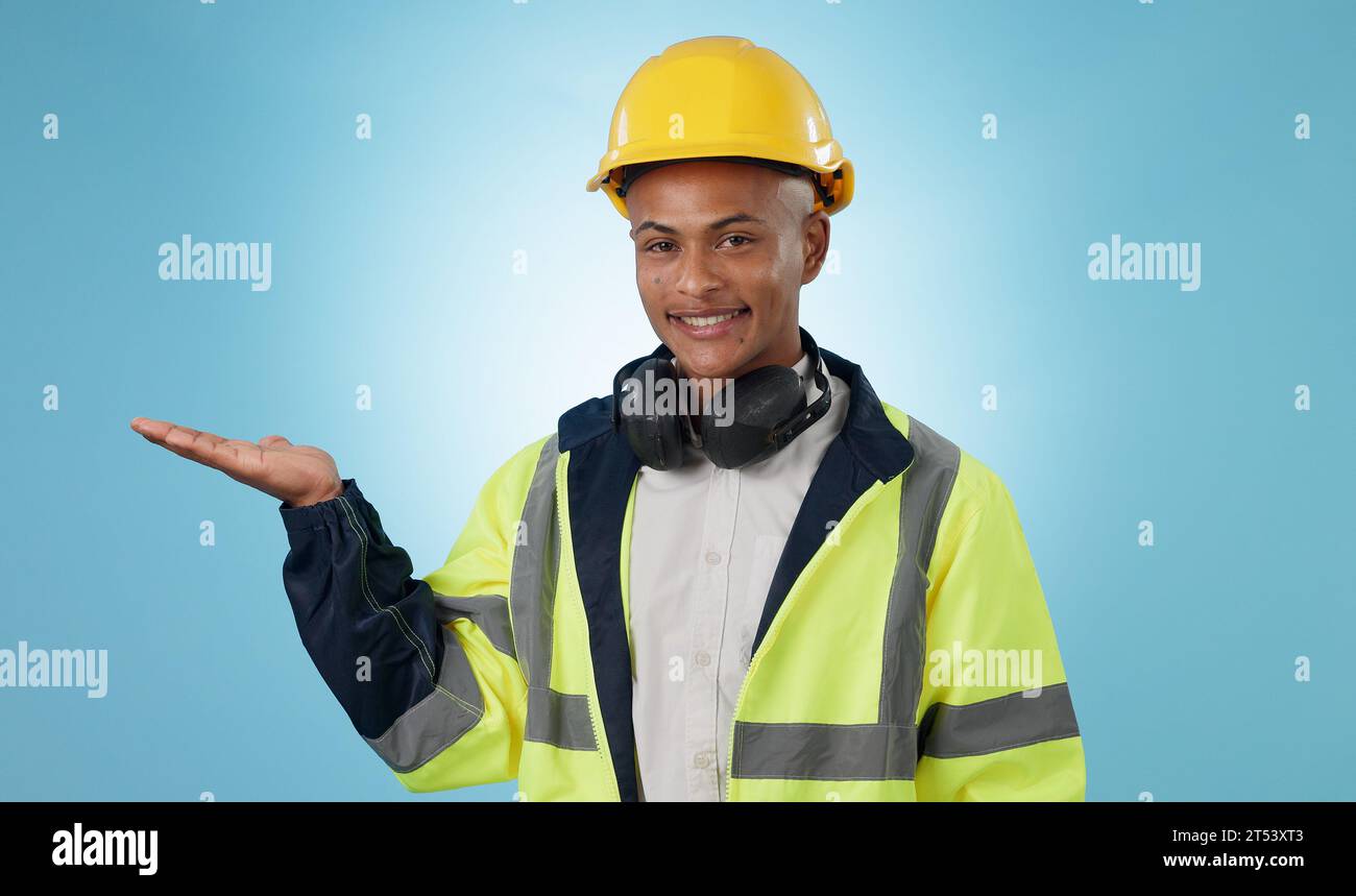 Happy, construction worker and portrait with hand advertising ...