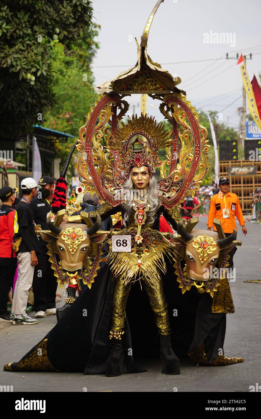 The participant Biro Fashion Carnival with a cow costume Stock Photo ...