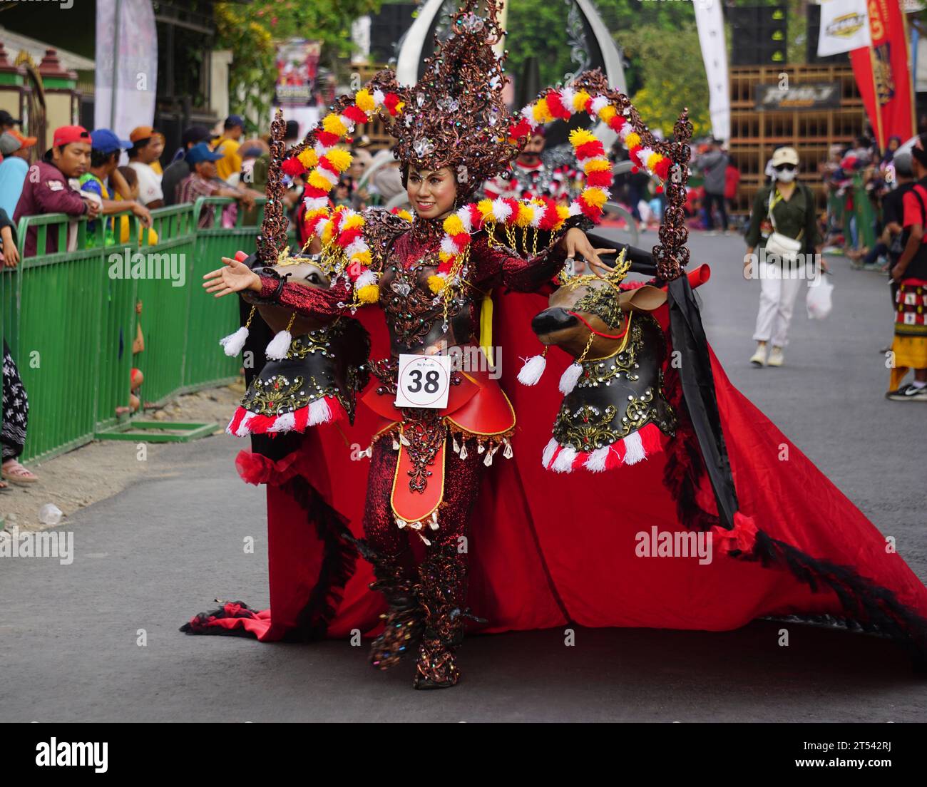 The participant Biro Fashion Carnival with a cow costume Stock Photo ...