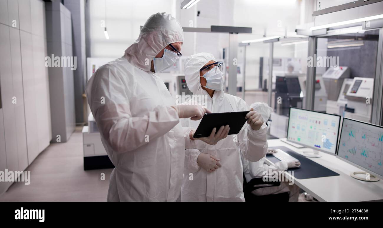 Factory Clean Room Laboratory. Industrial Engineer Using Technology ...