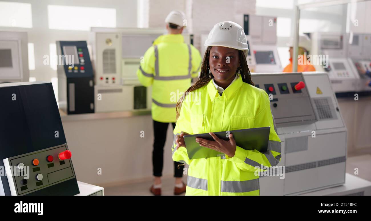 Industrial Job And Factory Worker Technician In Safety Uniform Stock ...