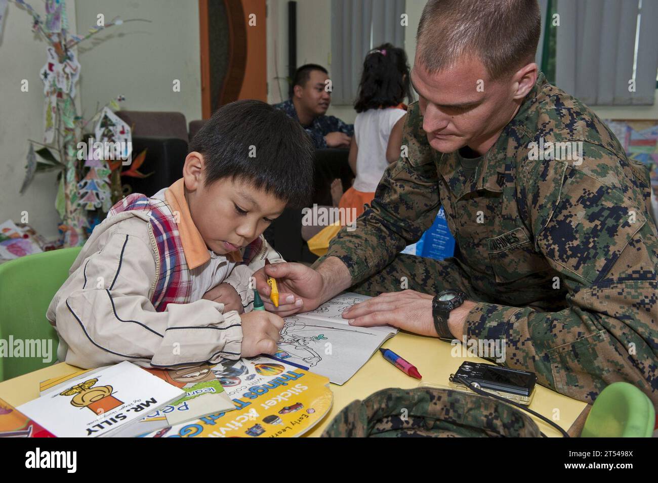 community service project, LHD 8, Singapore, USS Makin Island Stock ...