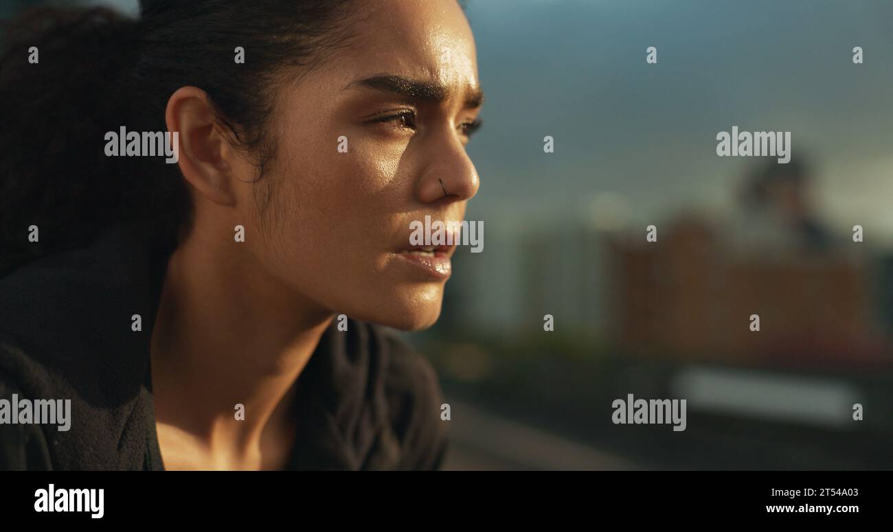 Woman, breathe and exhausted from exercise, run and fitness in outdoors ...