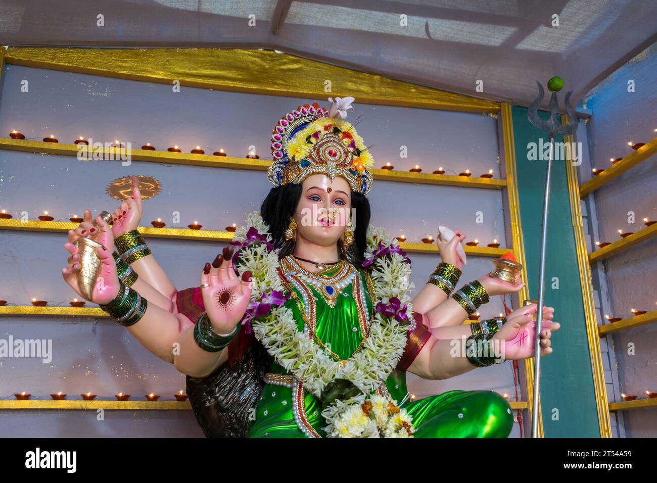 A beautiful idol of Maa Durga being worshipped at a pandal during ...