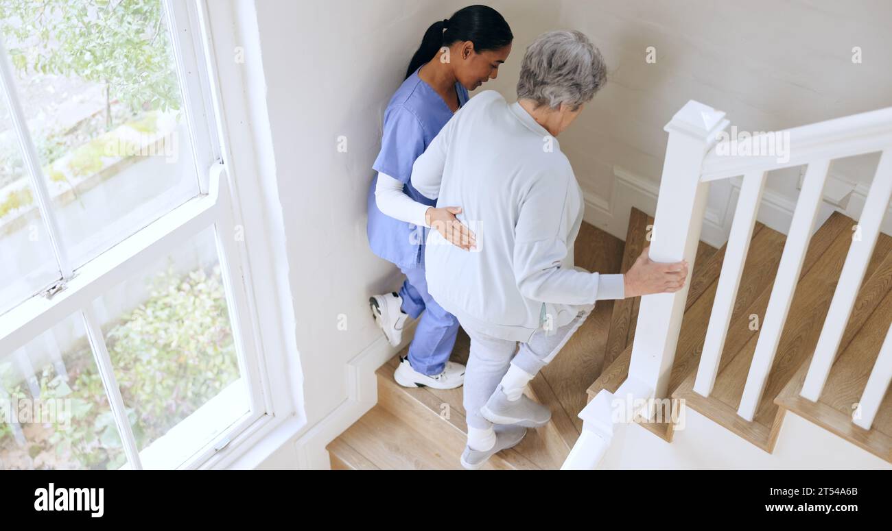 Nurse, senior woman and support on stairs, help and walk in nursing ...