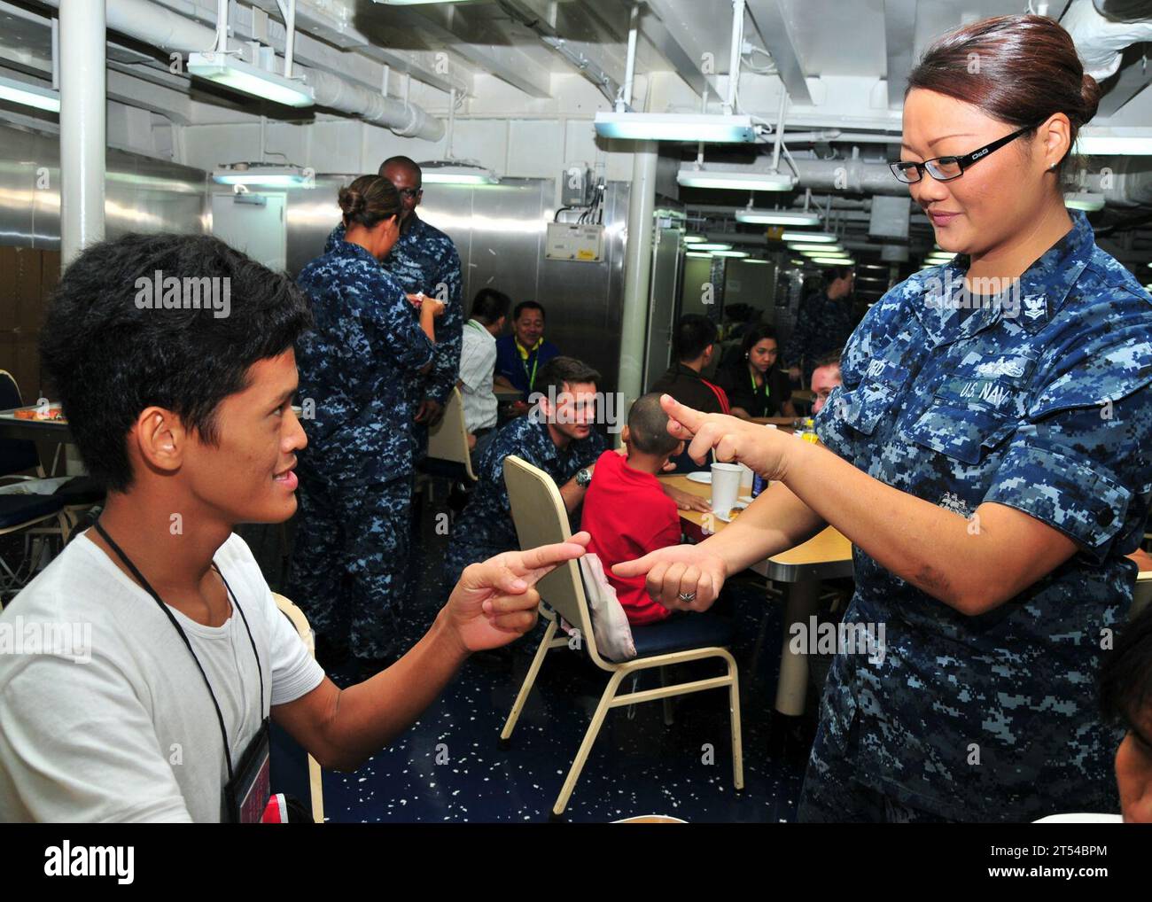 COMREL, Philippines, Sailors, Subic Bay, U.S. Navy, USS FRANK CABLE (AS ...