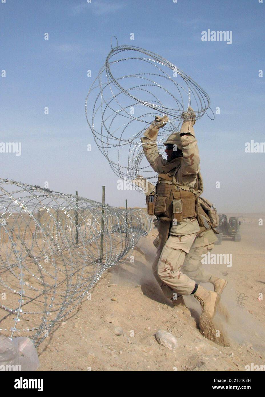 Triple strand concertina wire hi-res stock photography and images - Alamy