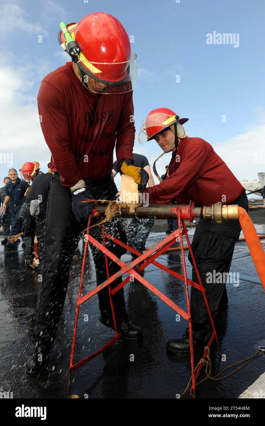 damage control Olympics, firefighting equipment, pipe patch, Sailor, U ...