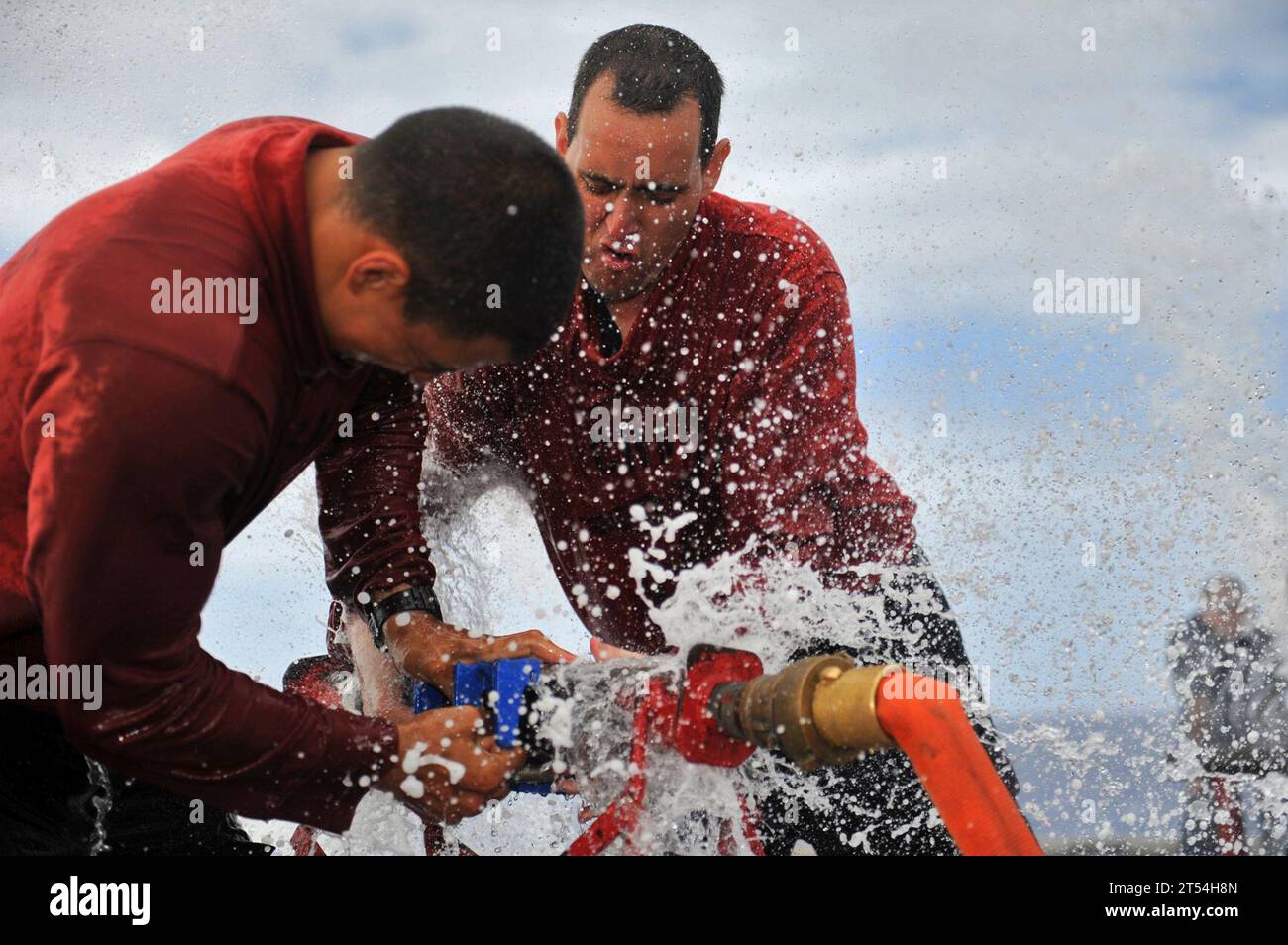 damage control Olympics, firefighting equipment, pipe patch, Sailor, U ...