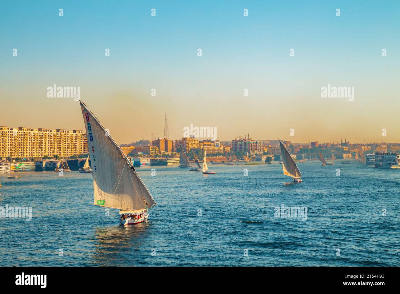 Traditional felucca boats on the Nile River in Aswan. Magnificent view ...