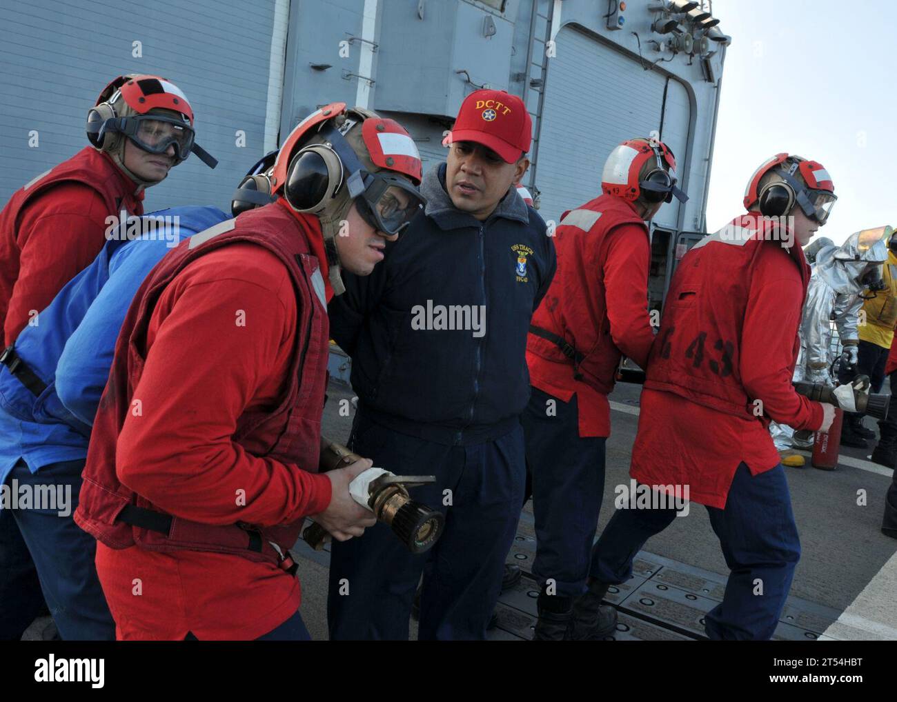 Damage Control Training, fire hose team, flight deck, guided-missile ...