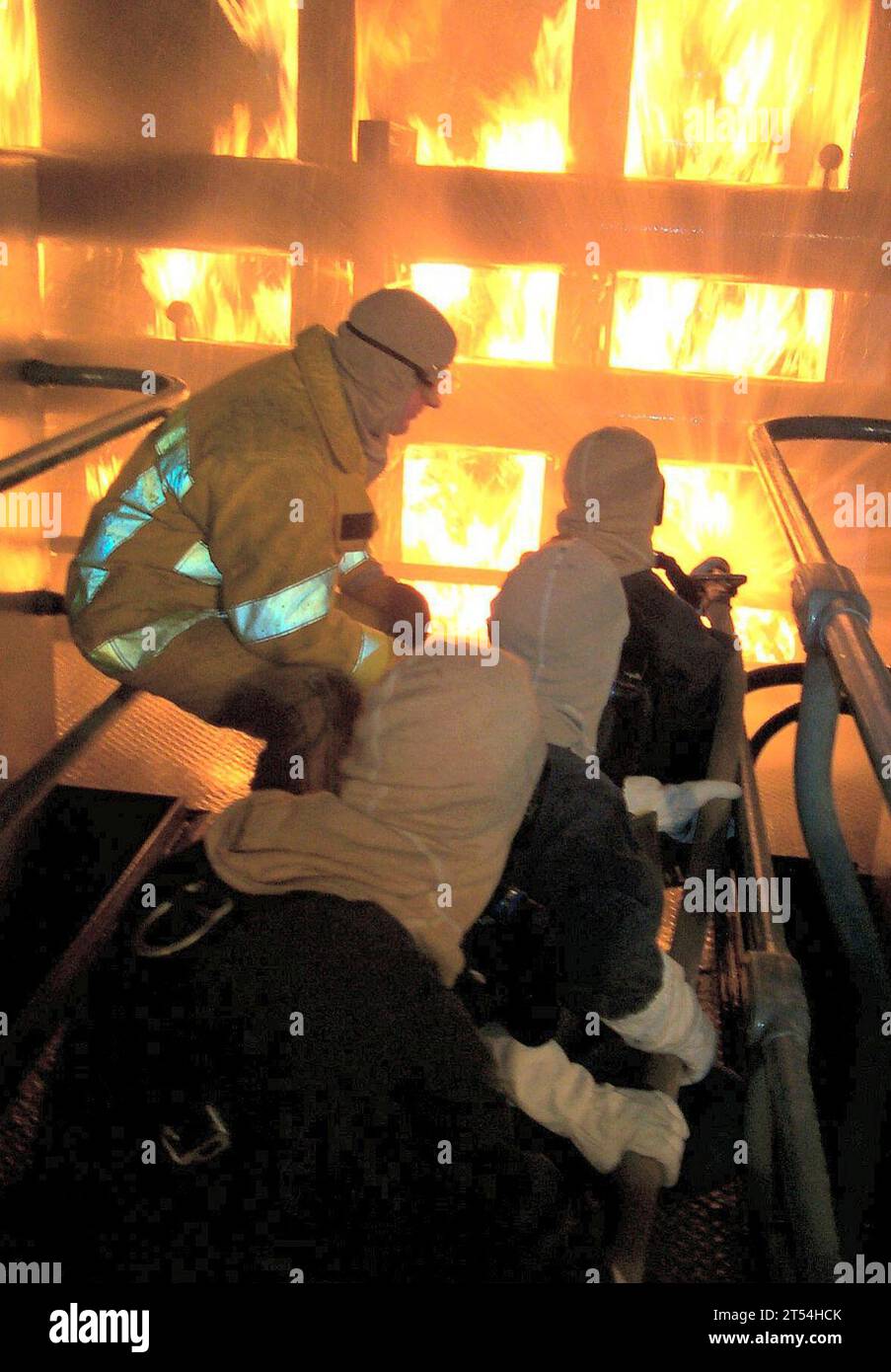Damage control firefighting sailors hi-res stock photography and images ...
