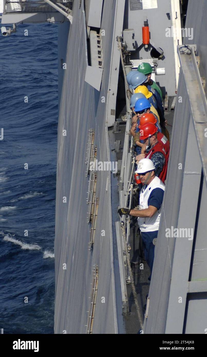 Deck Department Sailors, hard hats, rails, REPLENISHMENT AT SEA, safety ...