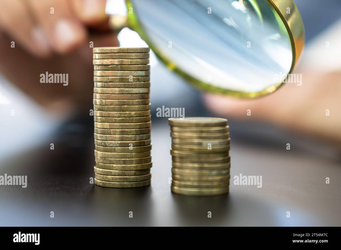 Comparing Wage Gaps: Analyzing Salary Equity and Money Stock Photo - Alamy