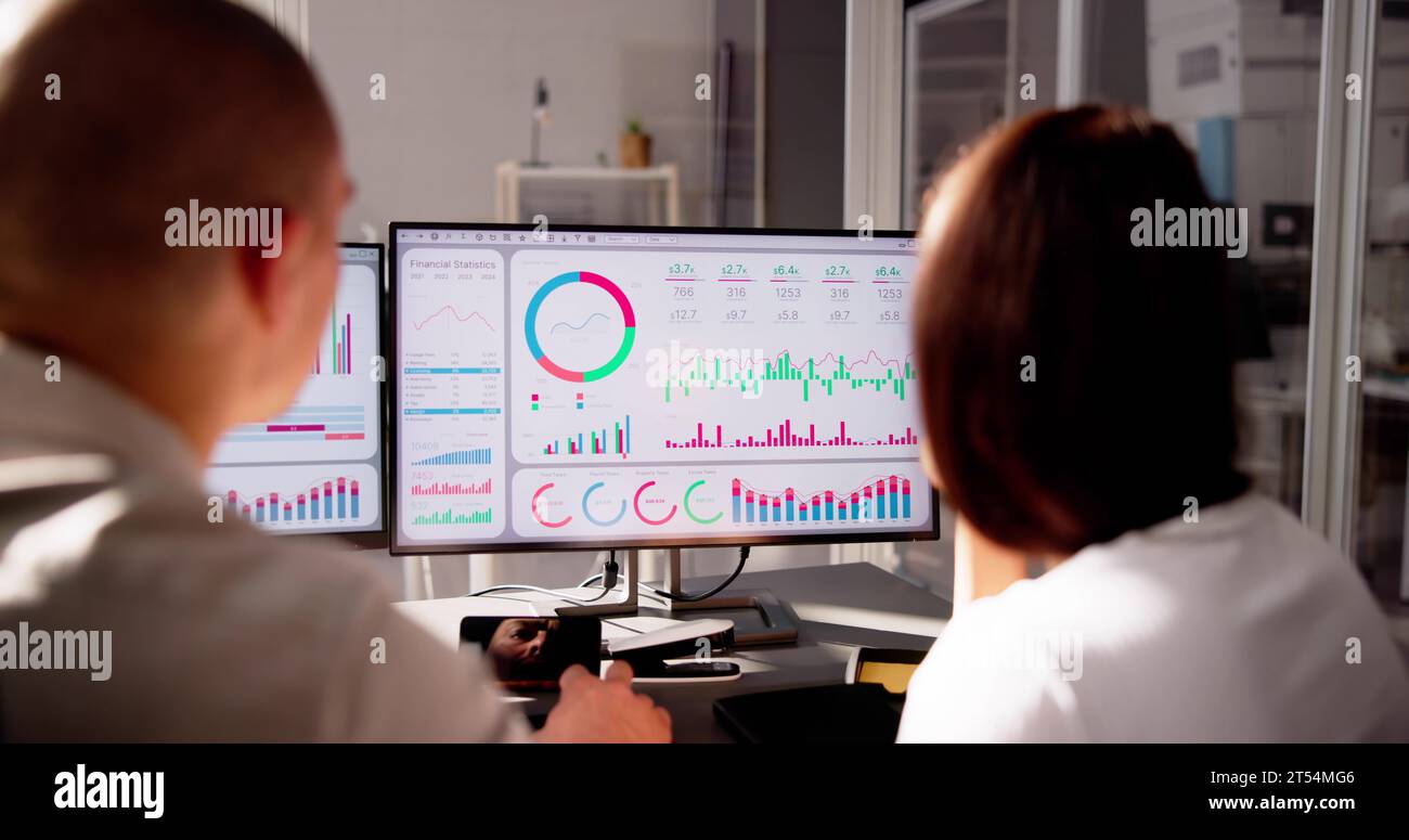 Two male financial analytics working hi-res stock photography and ...