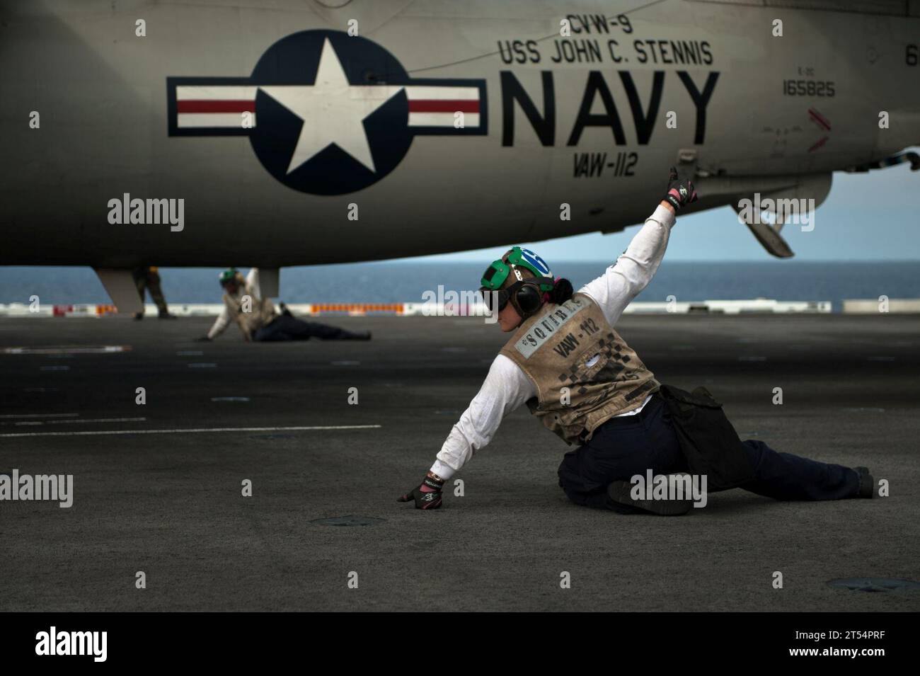 E-2C Hawkeye, female Sailor, flight deck, Pacific Ocean, Signal, U.S ...