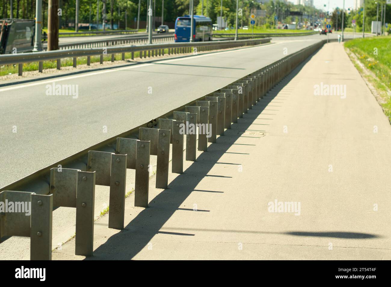 Highway bumper. Track on a summer day. Transport highway. Steel bumper ...