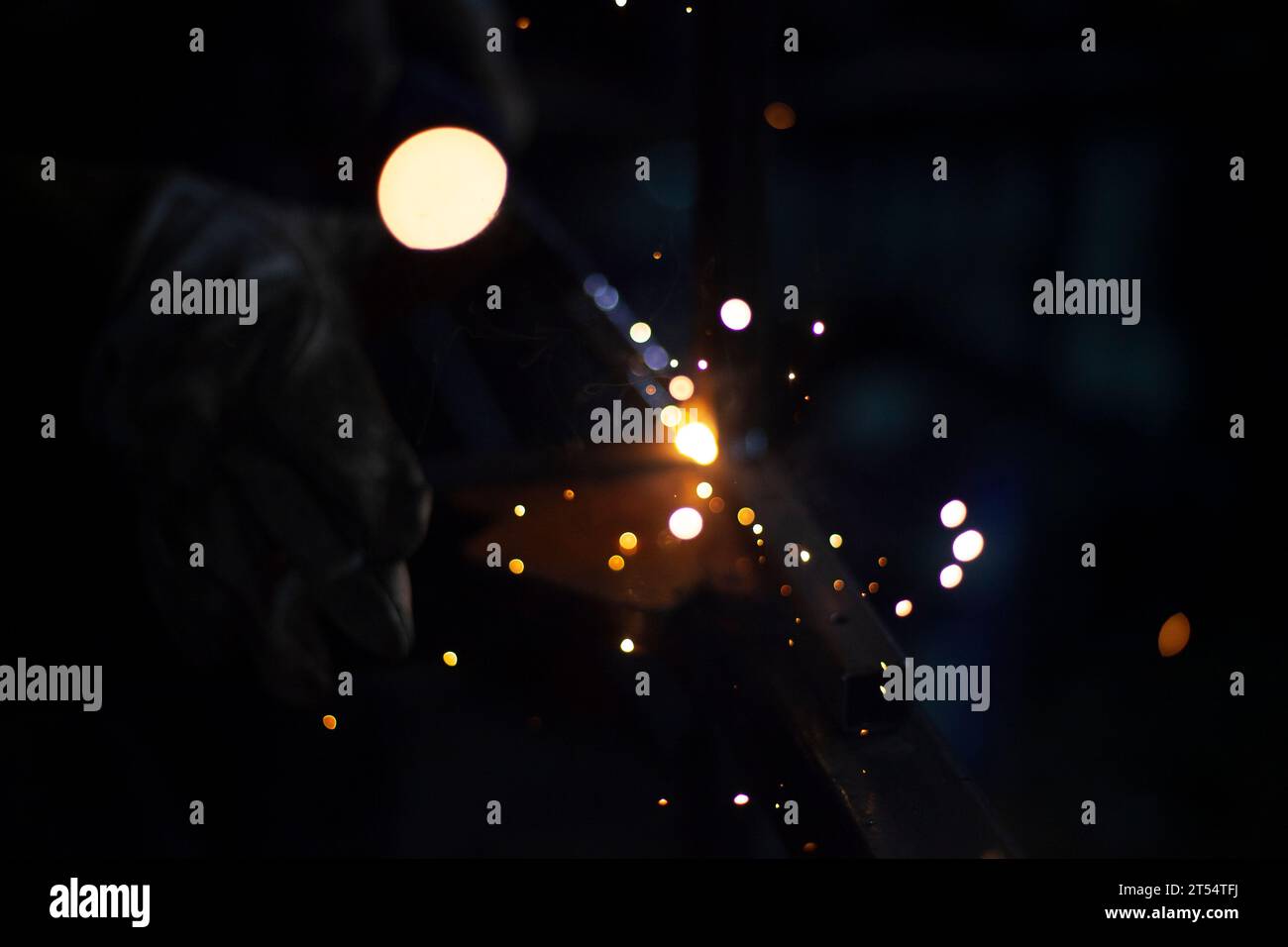 Light in the reflection of the ball. Out-of-focus shot of light points ...