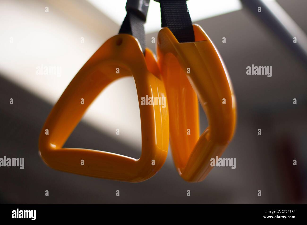 Handrail in the bus. Handrail for the hand in transport. Yellow handle ...