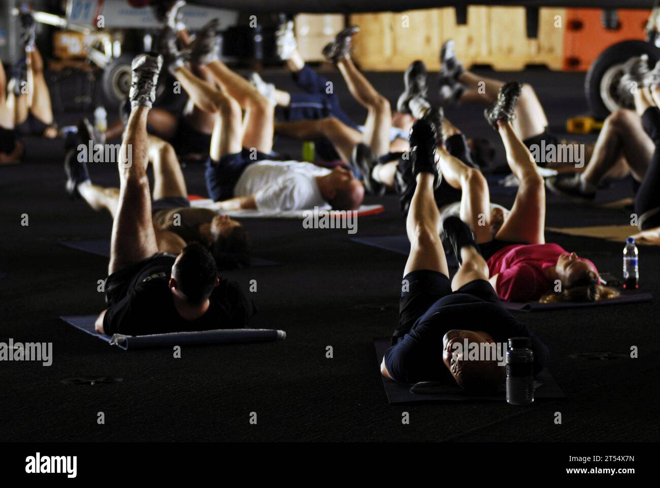 exercising, flutter kicks, HANGAR BAY, John C. Stennis Carrier Strike ...