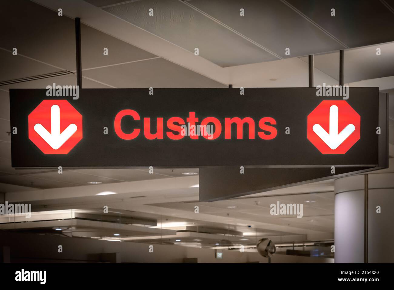 Customs sign in Airport and direction arrow, red and lighted. Travel ...