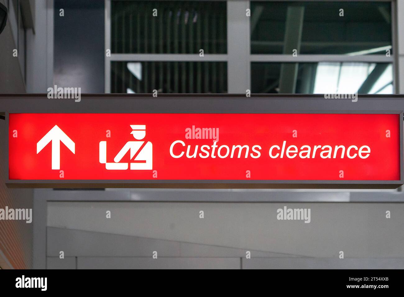 Customs sign in Airport and direction arrow, red and lighted. Travel ...