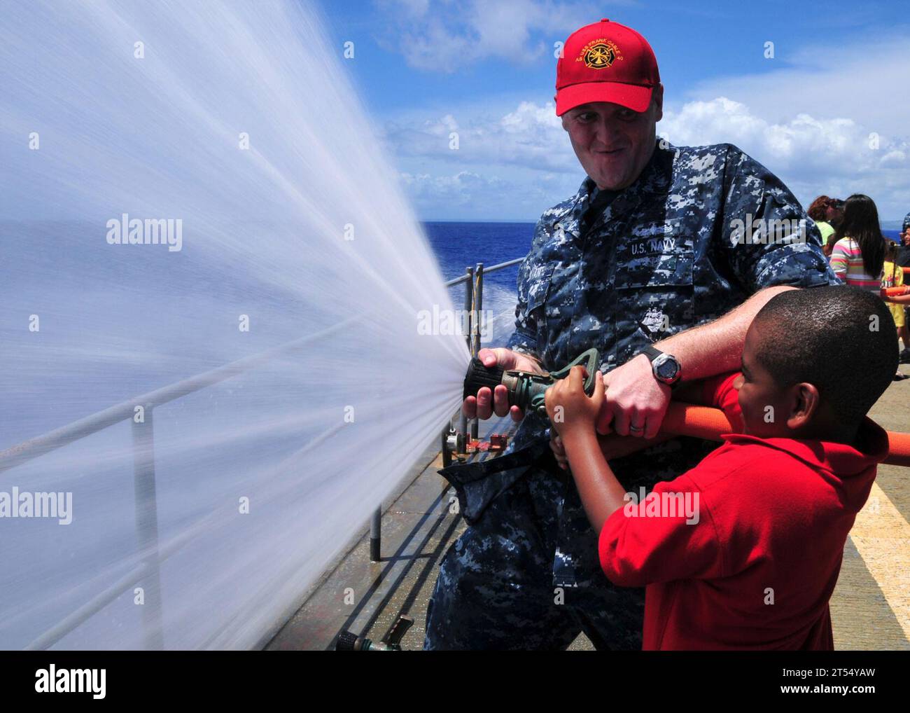 family, friends, hose handling, navy, U.S. Navy, USS FRANK CABLE (AS 40 ...