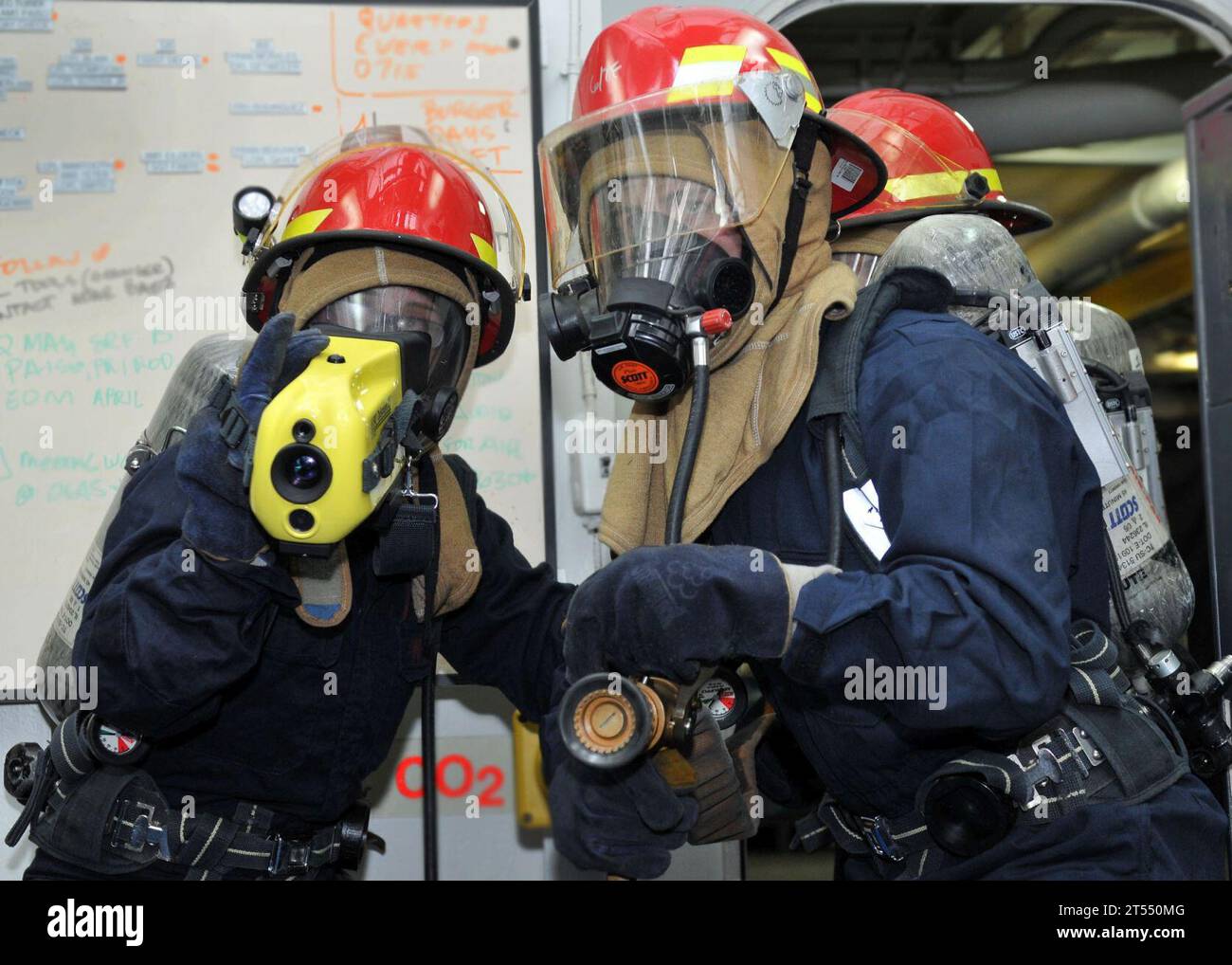 fire fighting, gq, Sailors, U.S. Navy Stock Photo - Alamy
