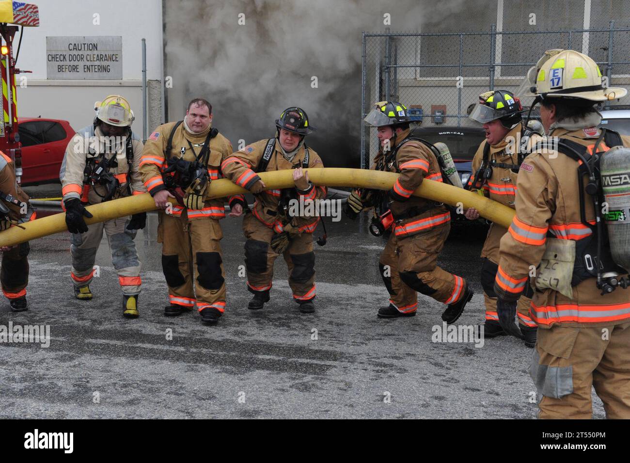 Us navy fire fighters hi-res stock photography and images - Alamy