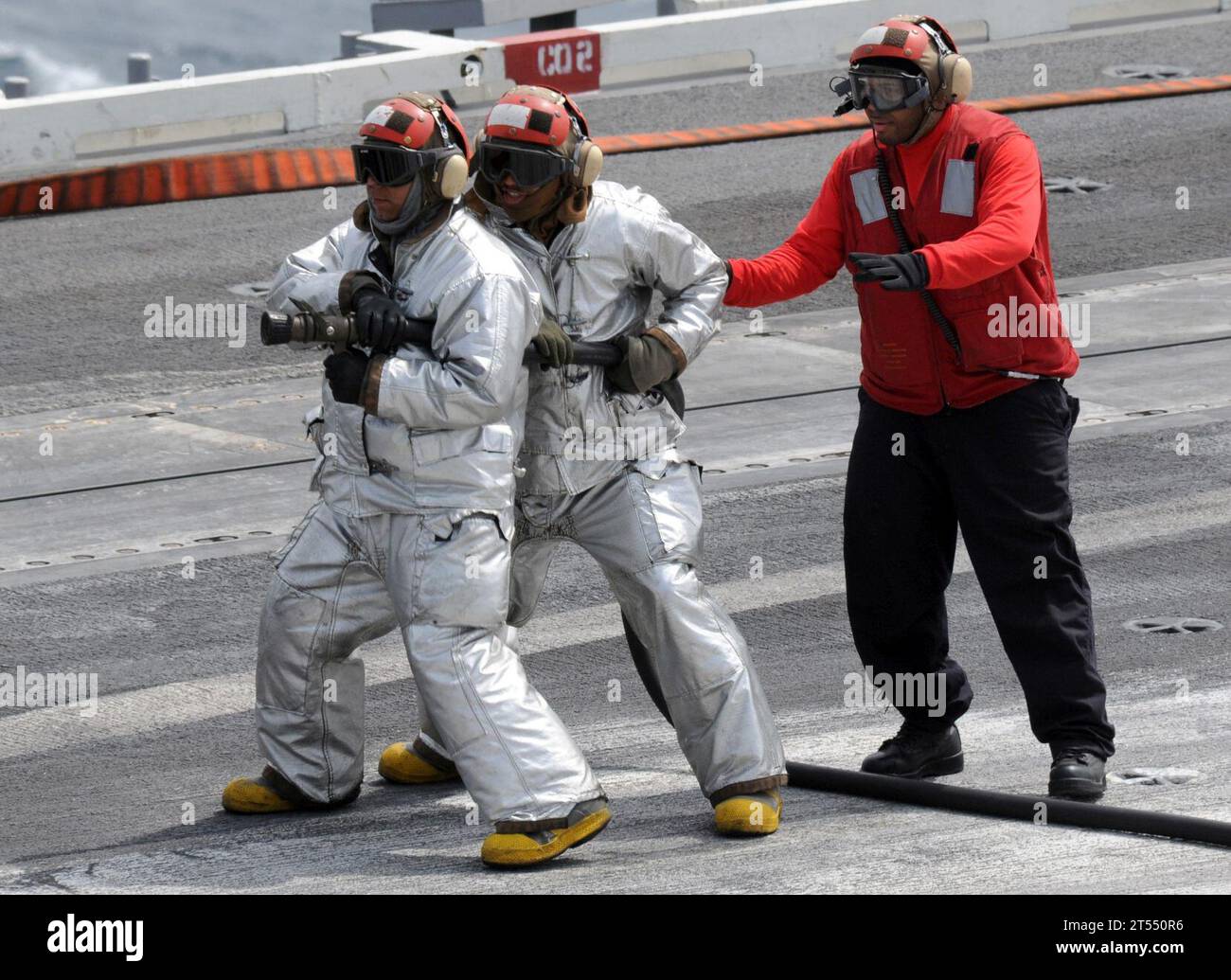 FIRE HOSE, flight deck, general quarters training exercise, U.S. navy ...