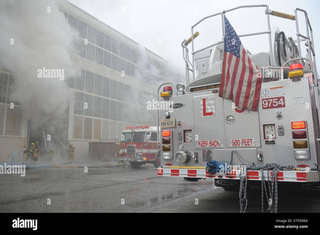 Us navy fire fighters hi-res stock photography and images - Alamy