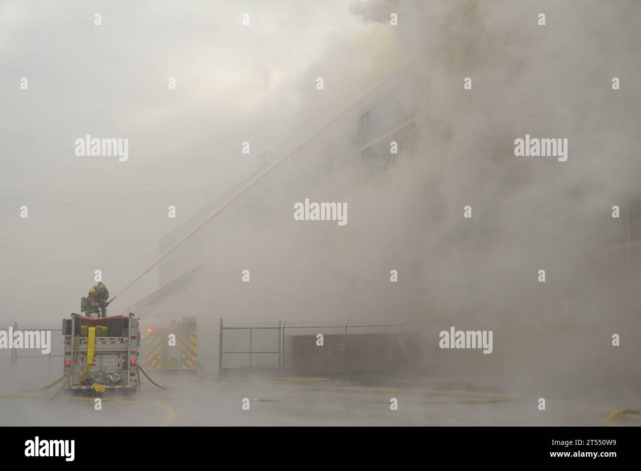 Us navy fire fighters hi-res stock photography and images - Alamy