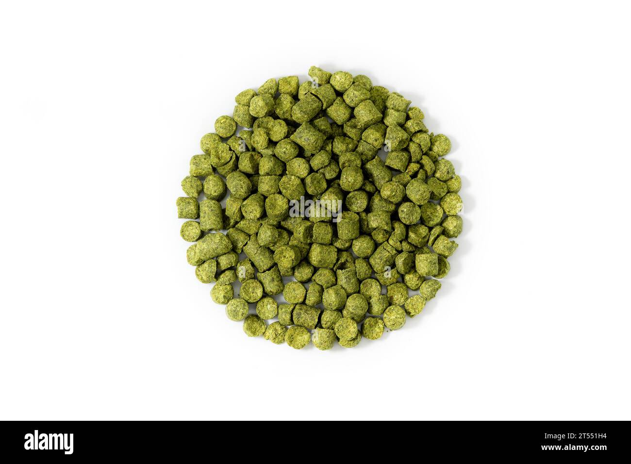 Pile of green hop pellets on white background Stock Photo - Alamy