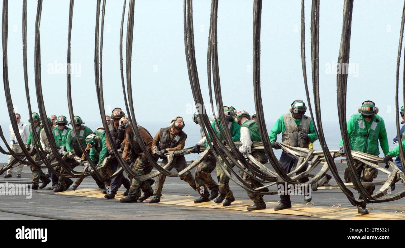 Flight deck green shirt hi-res stock photography and images - Alamy