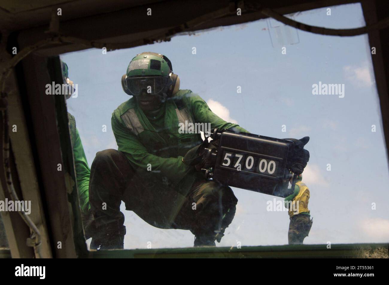 Flight deck green shirt hi-res stock photography and images - Alamy