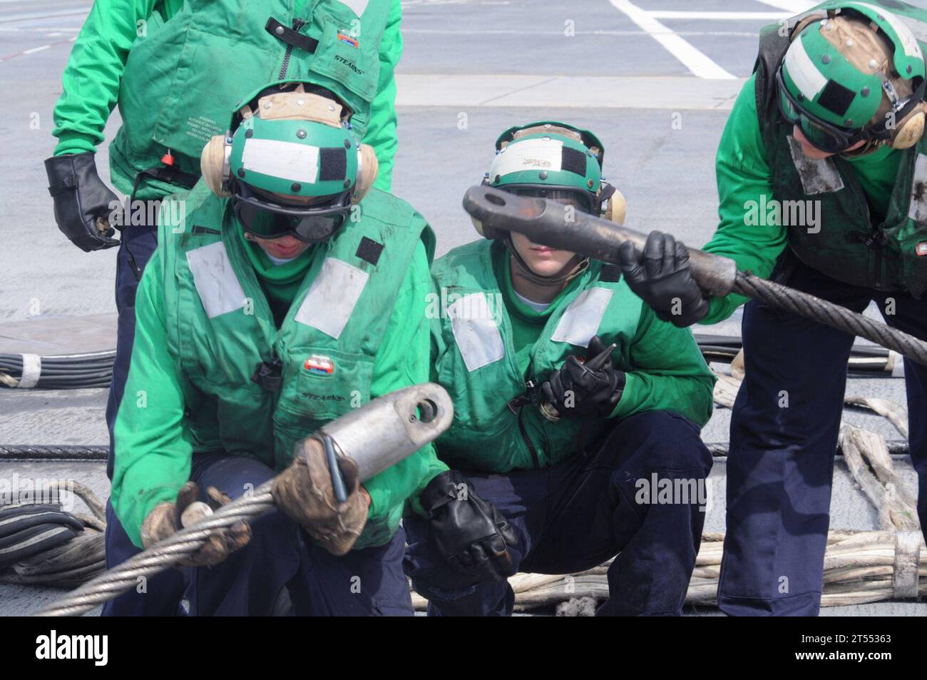 Flight deck green shirt hi-res stock photography and images - Alamy