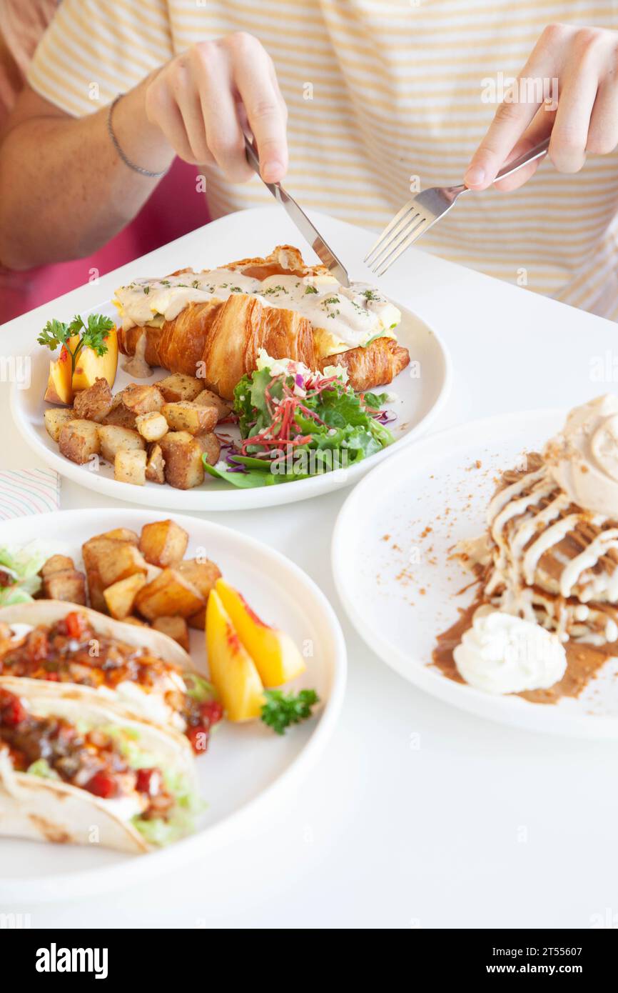 Breakfast brunch lifestyle food with hands at a cafe coffee shop Stock ...