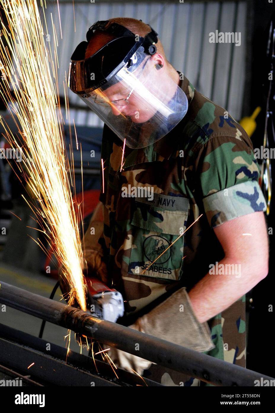 grinding, naval construction battalion, NMCB 7, pipe fitting, rota spain, Sailor, Seabee Stock ...