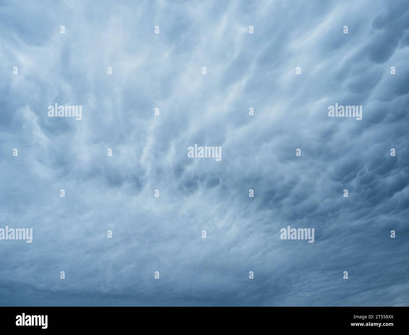 Dramatic blue sky with clouds. Spooky abstract background pattern ...