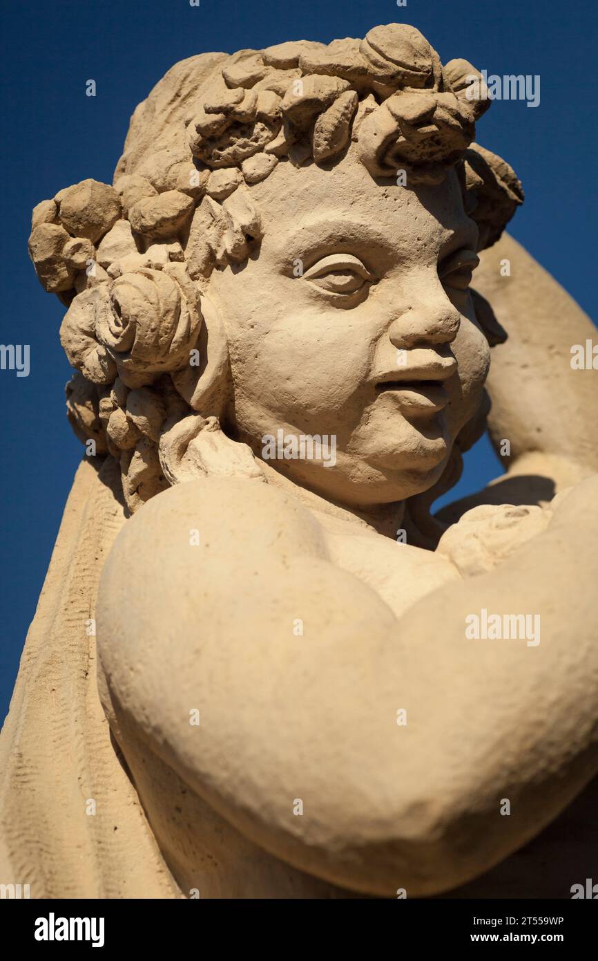 Close-up shot of a cherub statue at the baroque Zwinger palace in ...