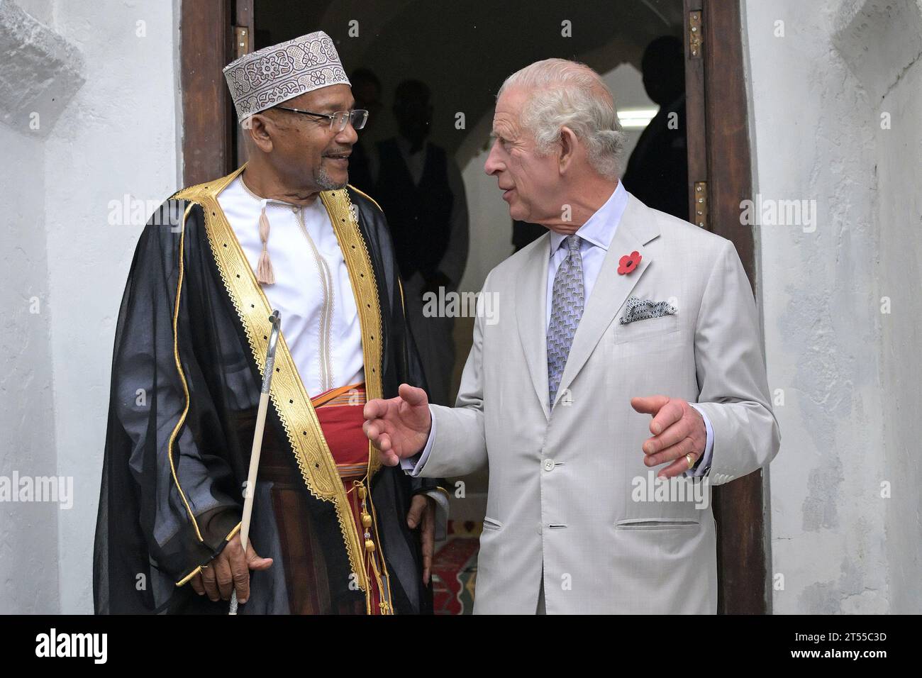 Britain's King Charles III, right, speaks with Chairperson of the ...