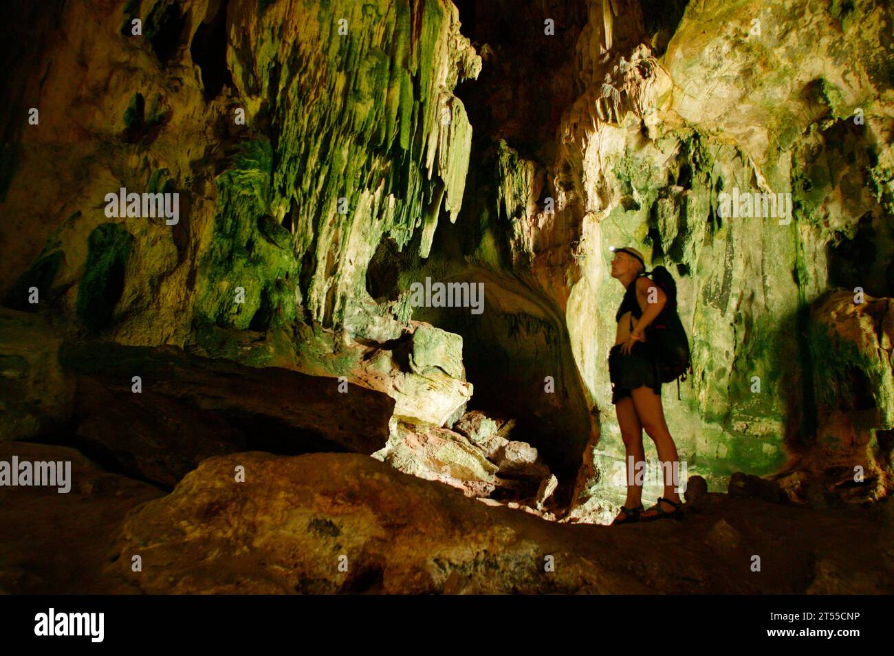 Person caving in Thailand Stock Photo - Alamy