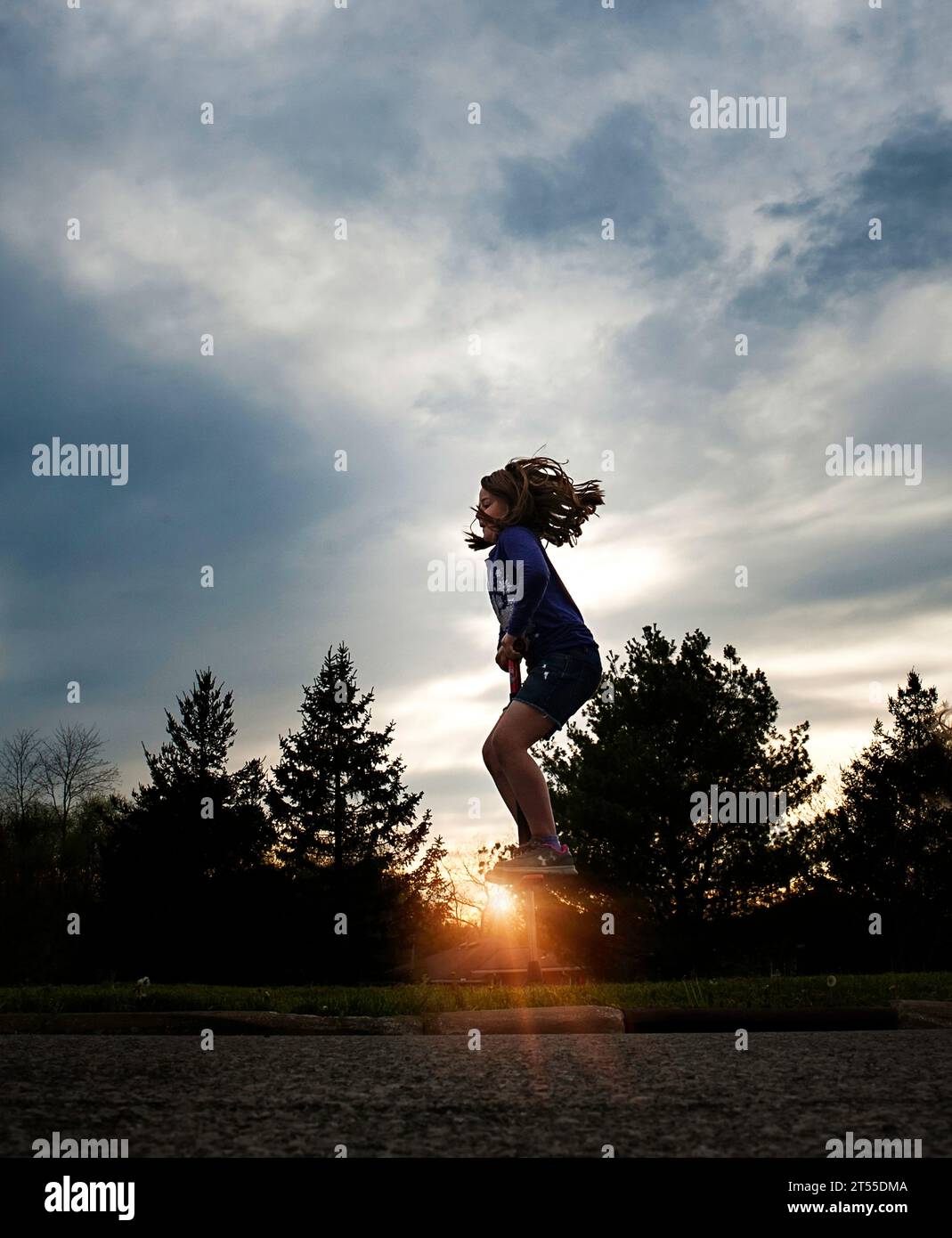 Pogo stick jumping hi-res stock photography and images - Alamy