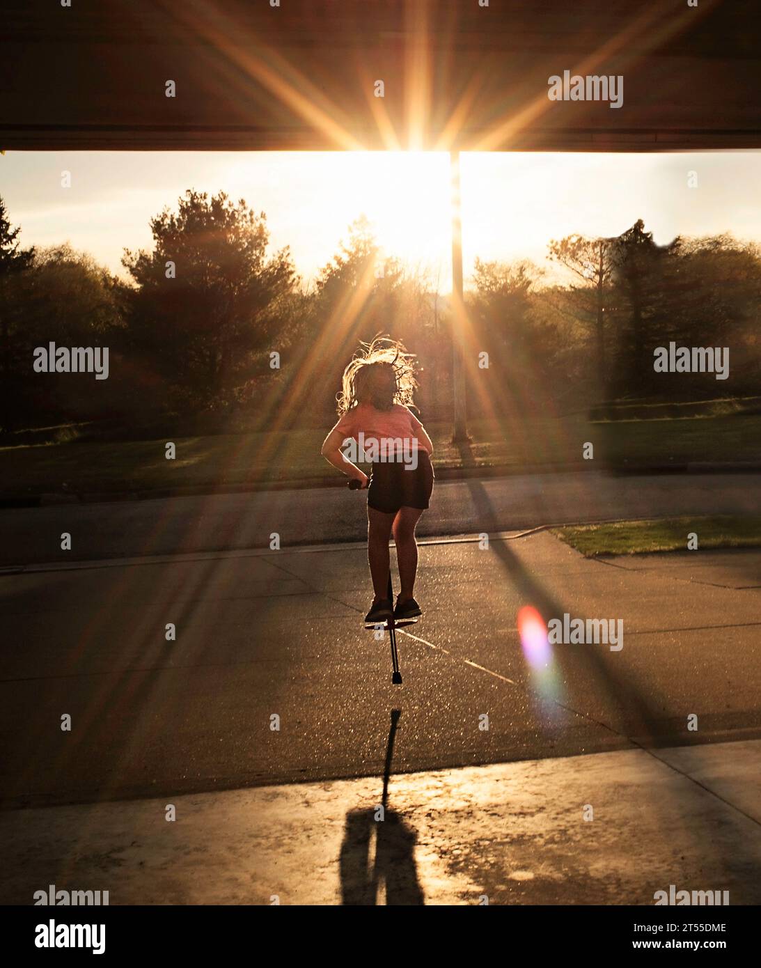 Pogo stick jumping hi-res stock photography and images - Alamy