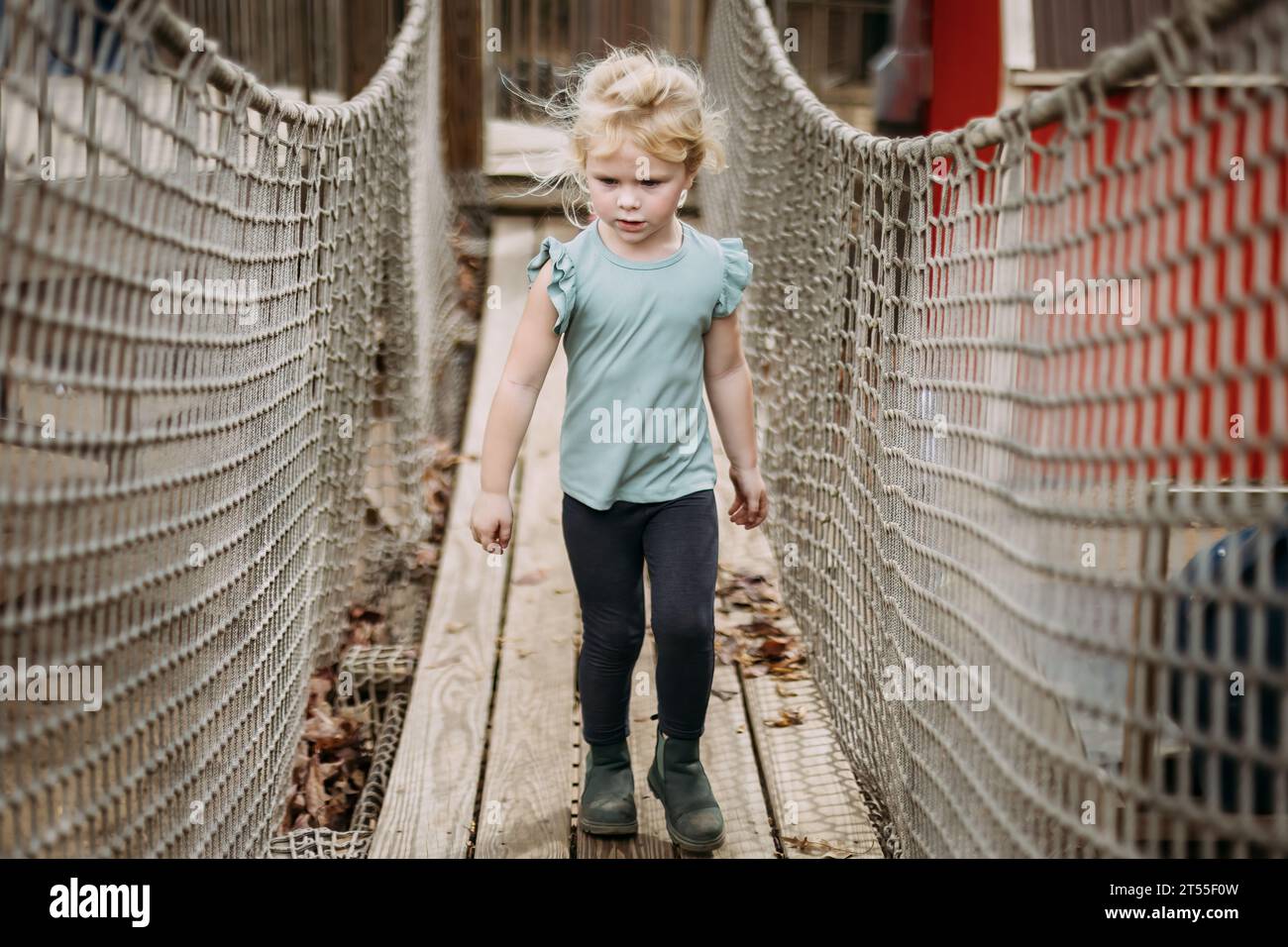 Children looking over bridge hi-res stock photography and images - Alamy