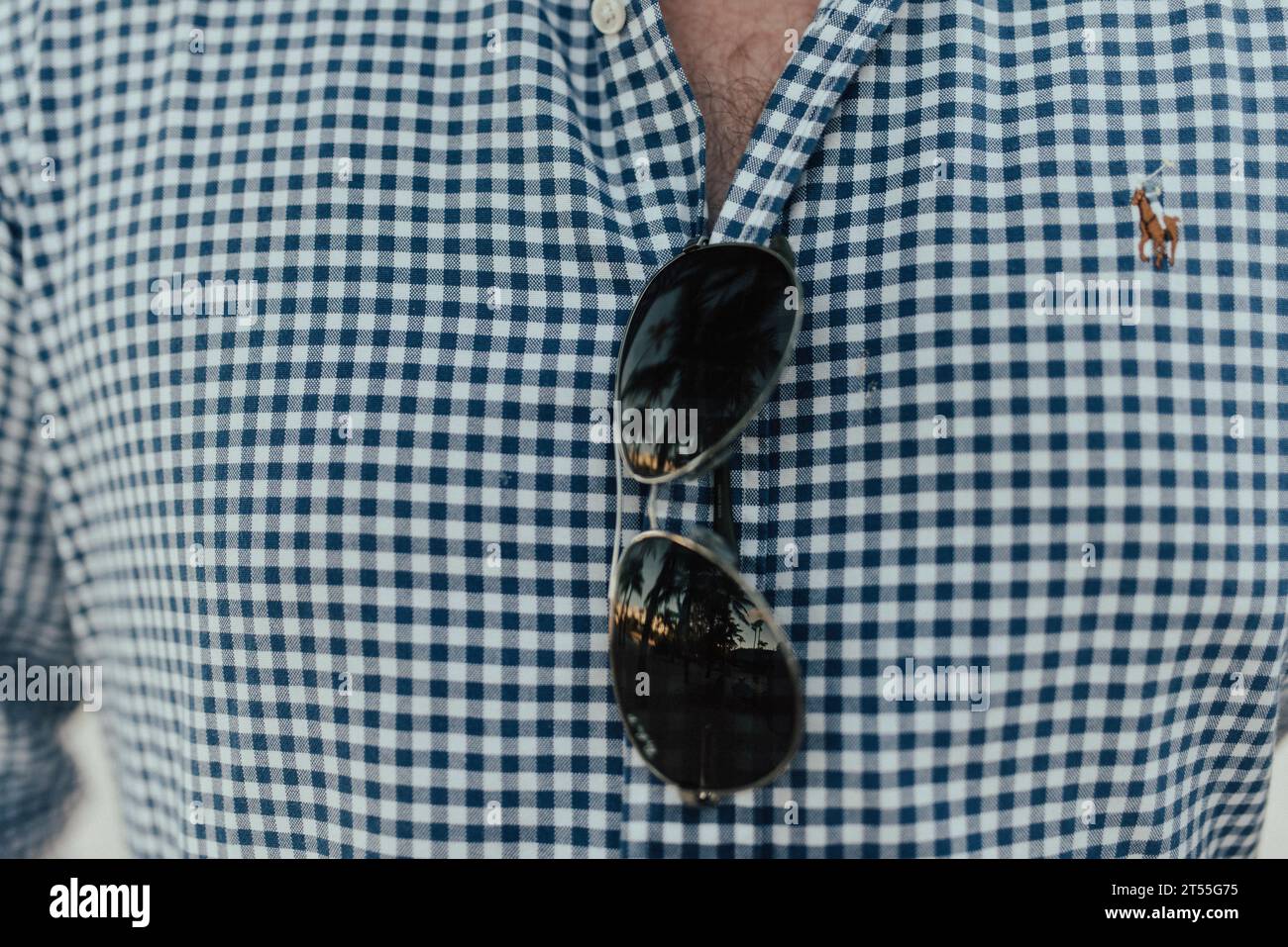 Ray Ban Sunglasses in Shirt Stock Photo - Alamy