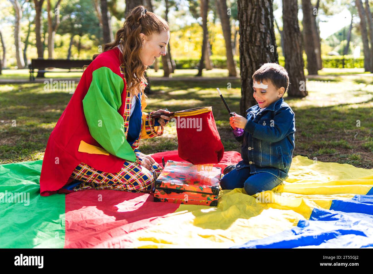 children's entertainer doing a magic trick to a child Stock Photo - Alamy