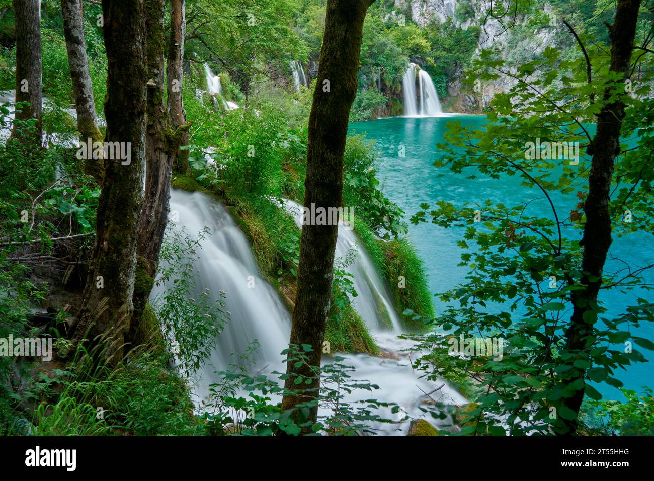 Crystal-clear waterfall in one of the lakes in Plitvice National Park ...