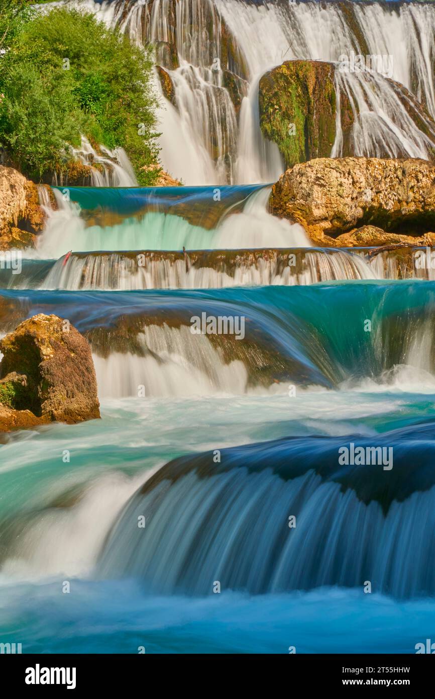 River and steps, limestone waterfalls in the Una National Park, Bosnia ...