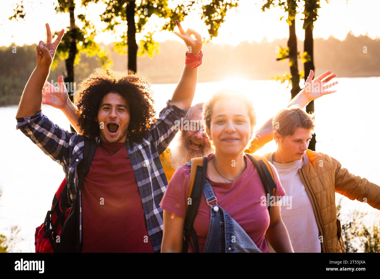 Bathed in the soft light of sunset, a scene of genuine camaraderie ...